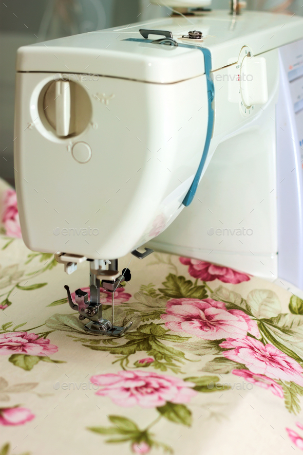 Modern sewing machine and item of clothing Stock Photo by Kateryna ...
