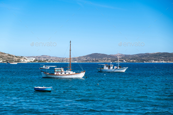 Milos Greek island, Cyclades. Fishing boat moored in open Aegean calm ...