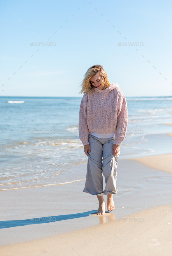 Walk on beach while cold weather Stock Photo by leszekglasner | PhotoDune