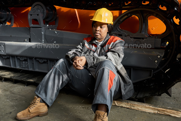 Worker resting on construction site Stock Photo by AnnaStills | PhotoDune