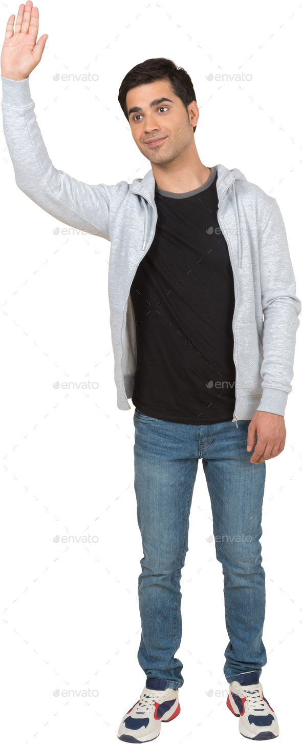 a young man wearing jeans and a white jacket with his hand up in the ...