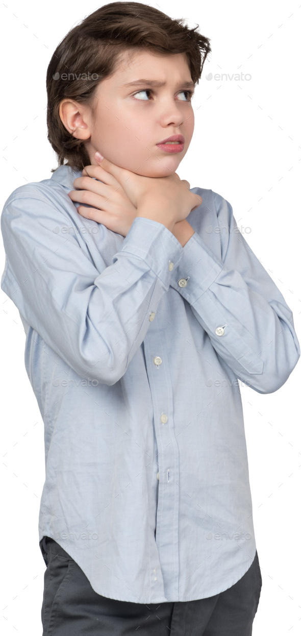 a young boy wearing a blue shirt with his hand on his neck Stock Photo ...