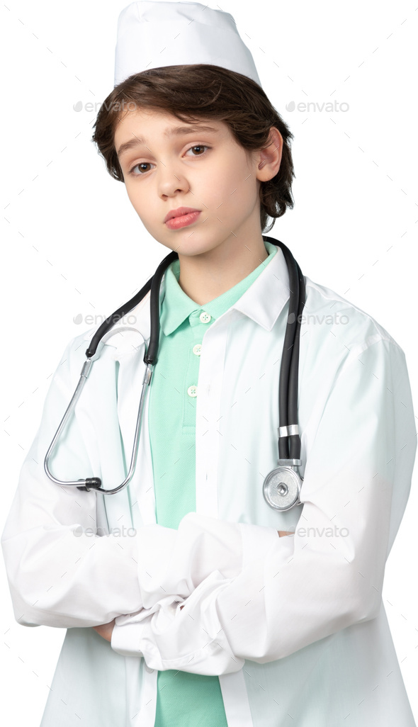 a young boy dressed as a doctor with a stethoscope Stock Photo by Icons8