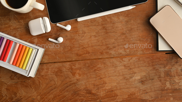 Device gadget on creative table with top view. Stock Photo by ...