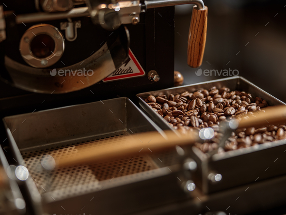 Professional coffee roasting machine with coffee beans Stock Photo by ...