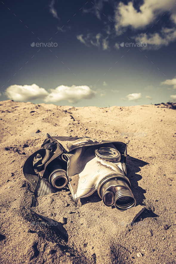 Contaminated gas mask in a polluted area by industry Stock Photo by Shaiith