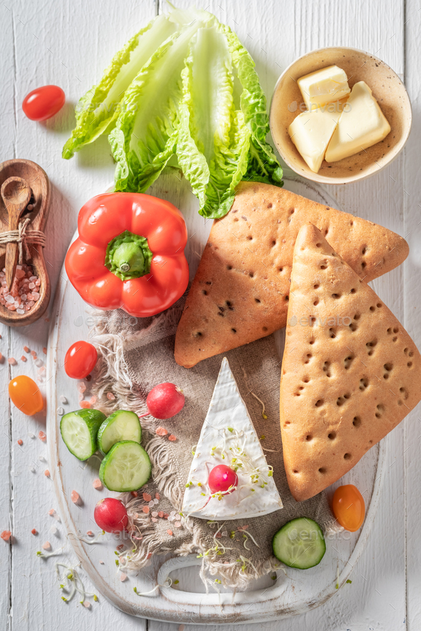 Top view of preparation for spring sandwich on white table Stock Photo ...