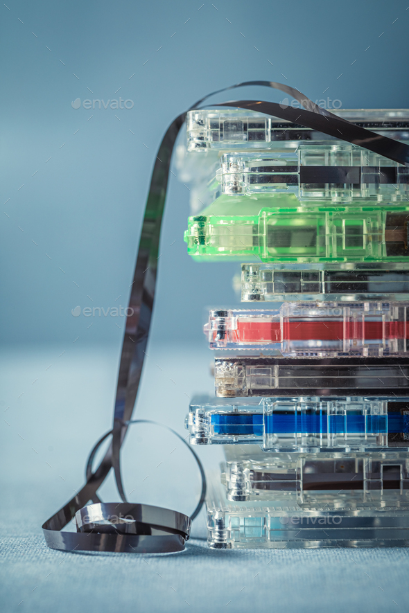Pile of classic cassette tapes with an extracted tape Stock Photo by ...