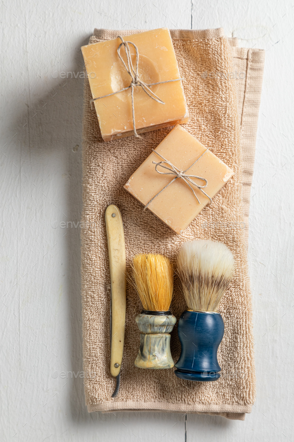 Vintage shaving set with razor, brush and soap Stock Photo by Shaiith