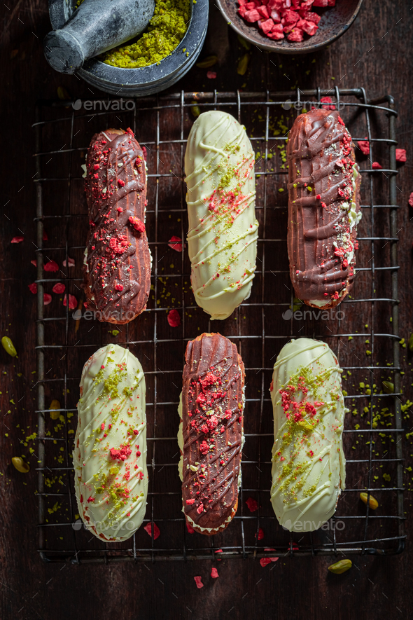 Tasty eclairs as snack made of chocolate Stock Photo by Shaiith | PhotoDune