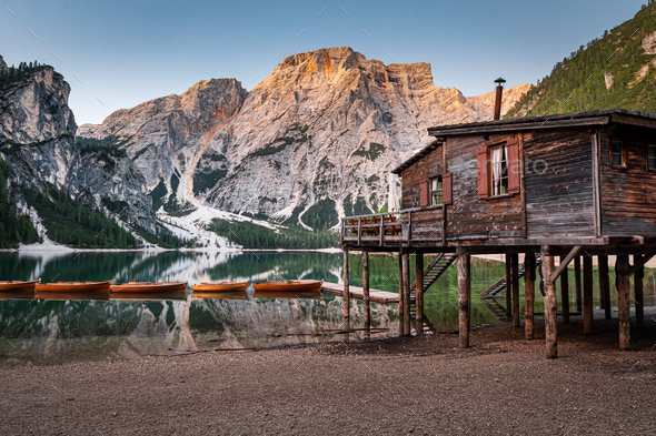 Stunning Lago di Braies at sunrise in Dolomites, Italy Stock Photo by ...