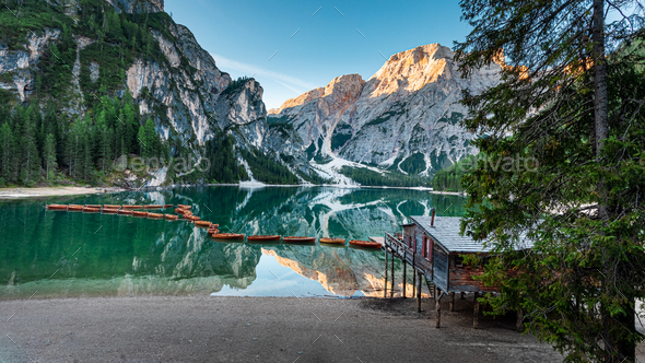Stunning Lago di Braies and wooden hut, Dolomites, Italy Stock Photo by ...
