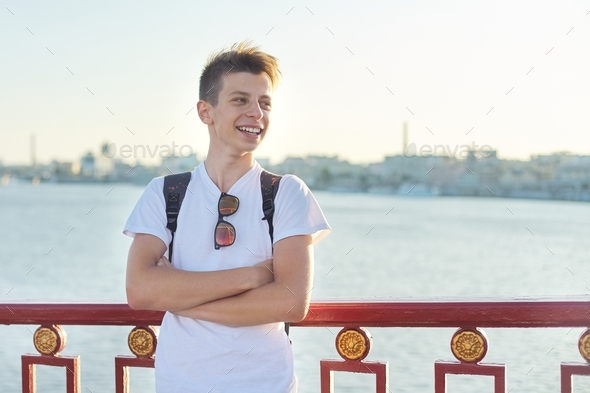Portrait of stylish smiling teenage boy of 15 years old Stock Photo by ...