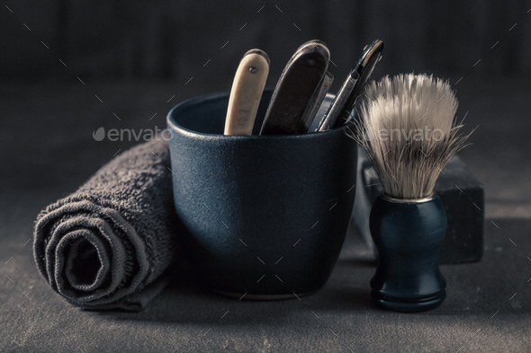 Unique tools for shave. Sharp razor, soap and brush Stock Photo by Shaiith