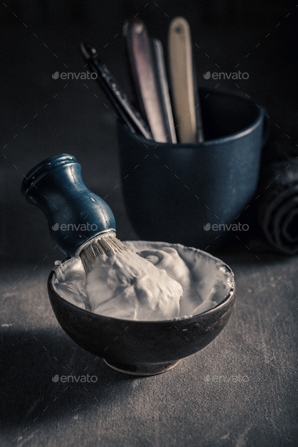 Vintage shave tools with grey soap, razor and brush Stock Photo by Shaiith