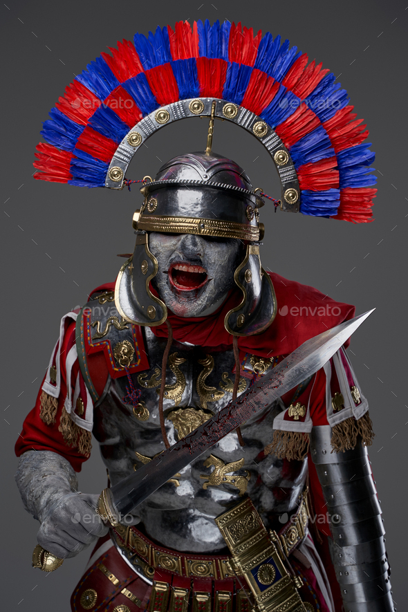 Angry dead roman soldier with helmet and sword Stock Photo by fxquadro