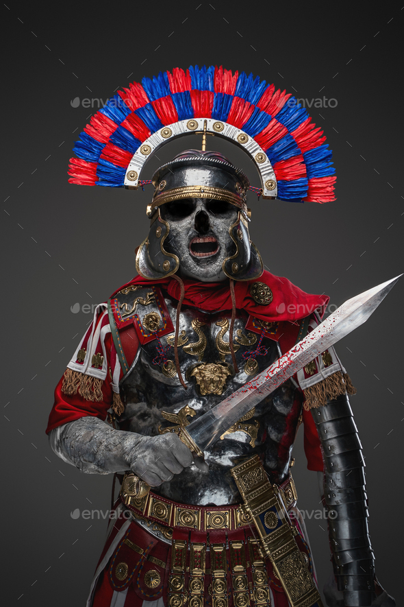 Spooky undead legionary with sword dressed in armor Stock Photo by fxquadro