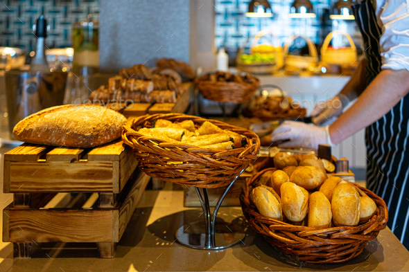cutting board with bread self service table breakfast buffet in hotel ...