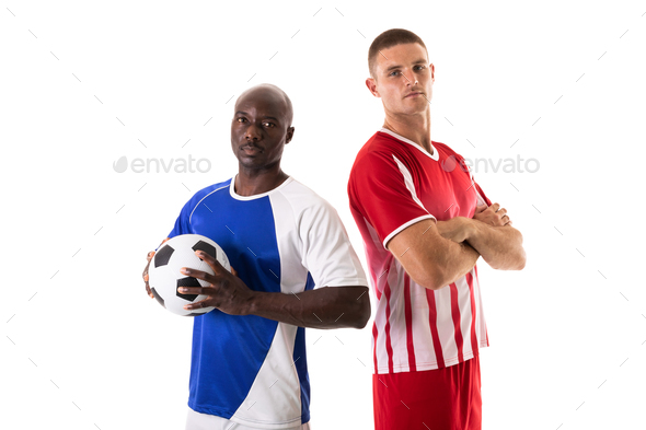 Portrait of confident young male multiracial soccer competitors ...