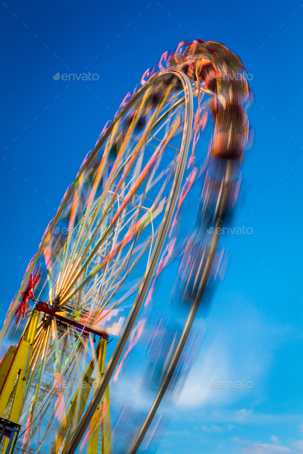 Blurry ferris wheel in motion Stock Photo by Shaiith | PhotoDune