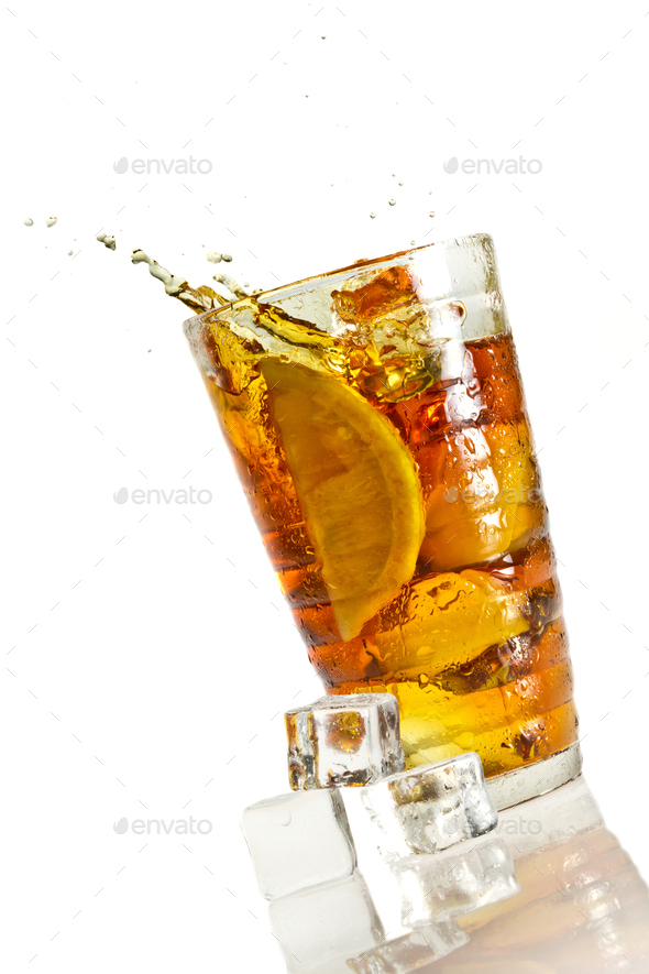 Ice tea with splash with cube Stock Photo by Shaiith | PhotoDune