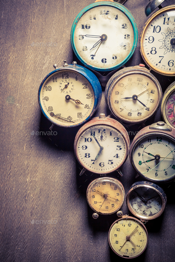 Vintage clocks in pile Stock Photo by Shaiith | PhotoDune