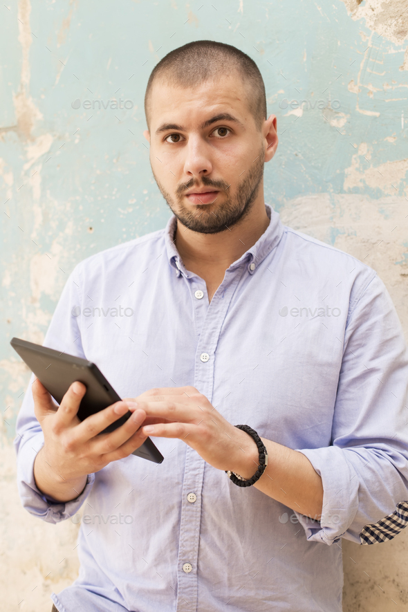 Man with a tablet Stock Photo by BGStock72 | PhotoDune