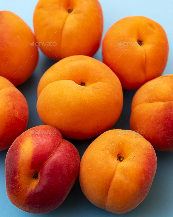 Set of apricots placed in the shape of a flower Stock Photo by armacuatro