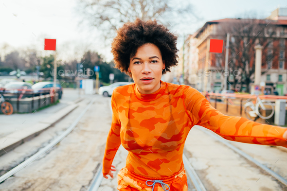 Young black woman outdoor looking over contemplative dancing Stock ...