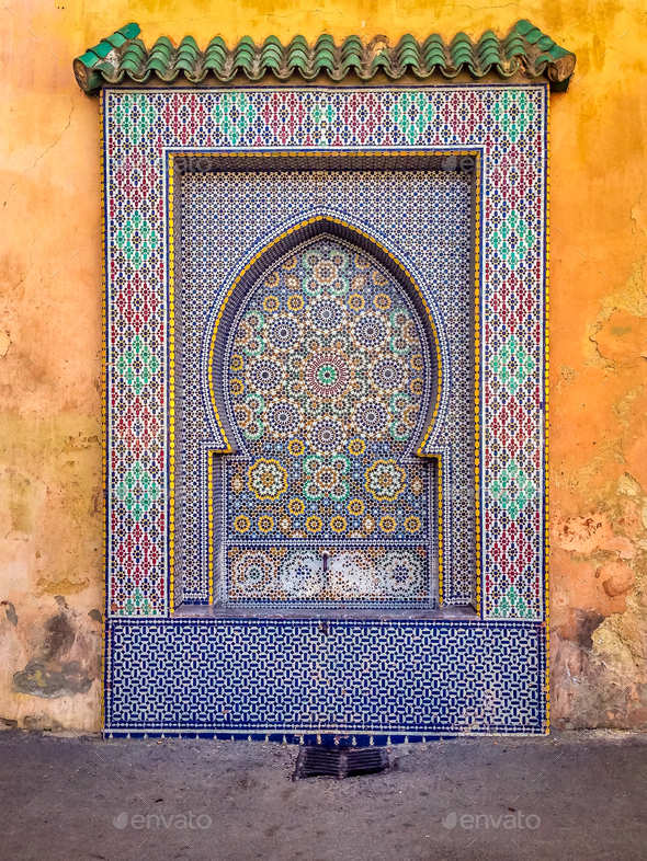 Traditional water fountain - Fez, Morocco Stock Photo by diegograndi