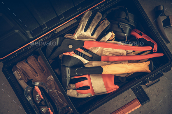 Contractor Toolbox with Tools, Gloves and Glasses Stock Photo by duallogic