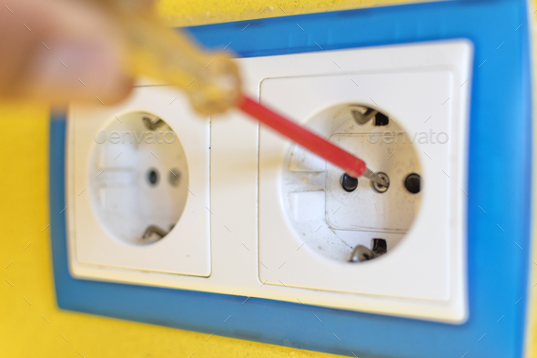 Repair concept of electrical plugs Stock Photo by armacuatro | PhotoDune