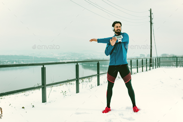 Stretching In Cold Stock Photo by micens | PhotoDune