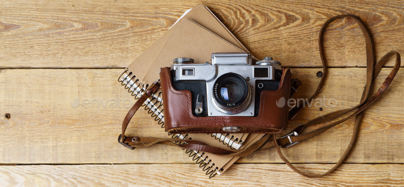 Old retro camera on vintage rustic wooden planks boards. Stock Photo by ...