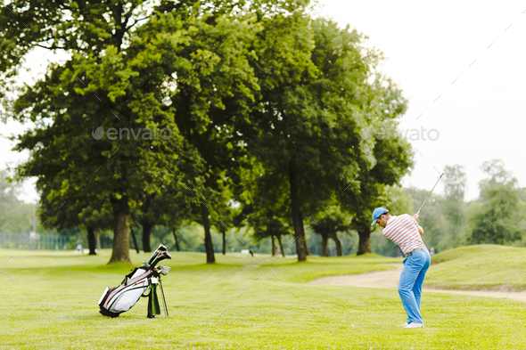 Golf player Stock Photo by BGStock72 | PhotoDune