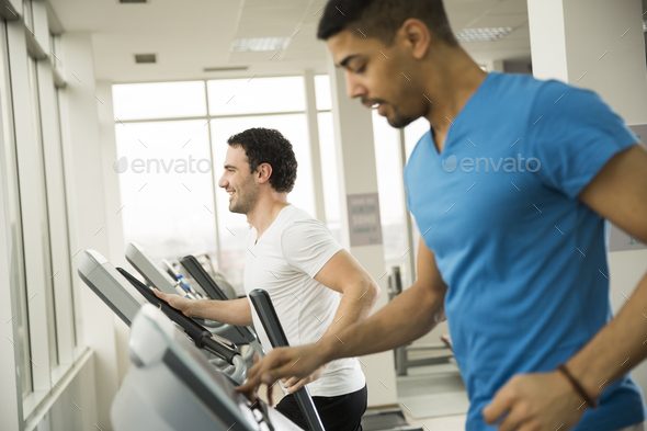 Young multiracial men in the gym Stock Photo by BGStock72 | PhotoDune