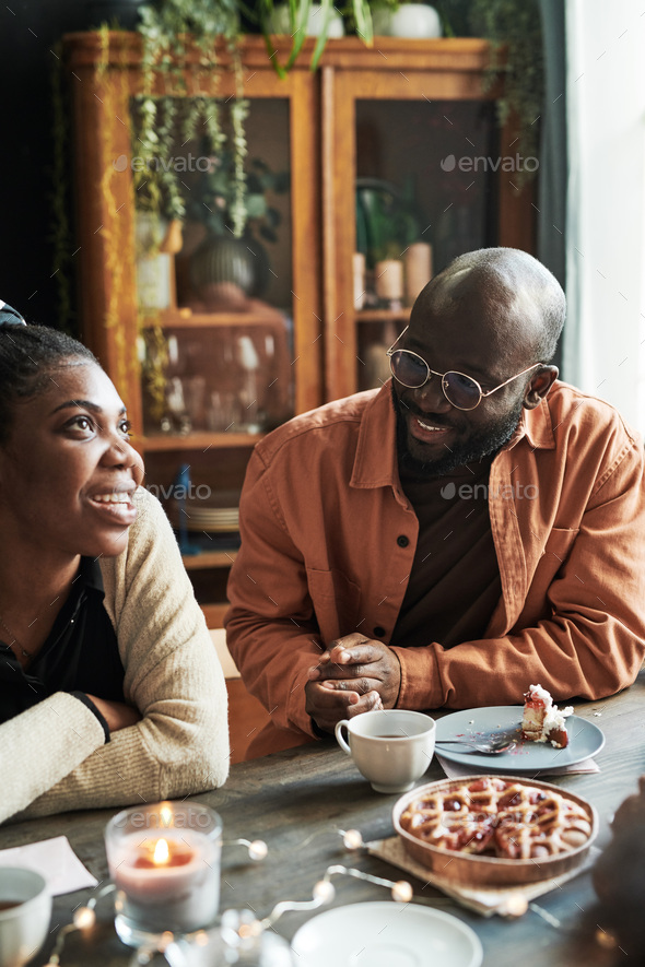 Couple talking at table during dessert Stock Photo by AnnaStills ...