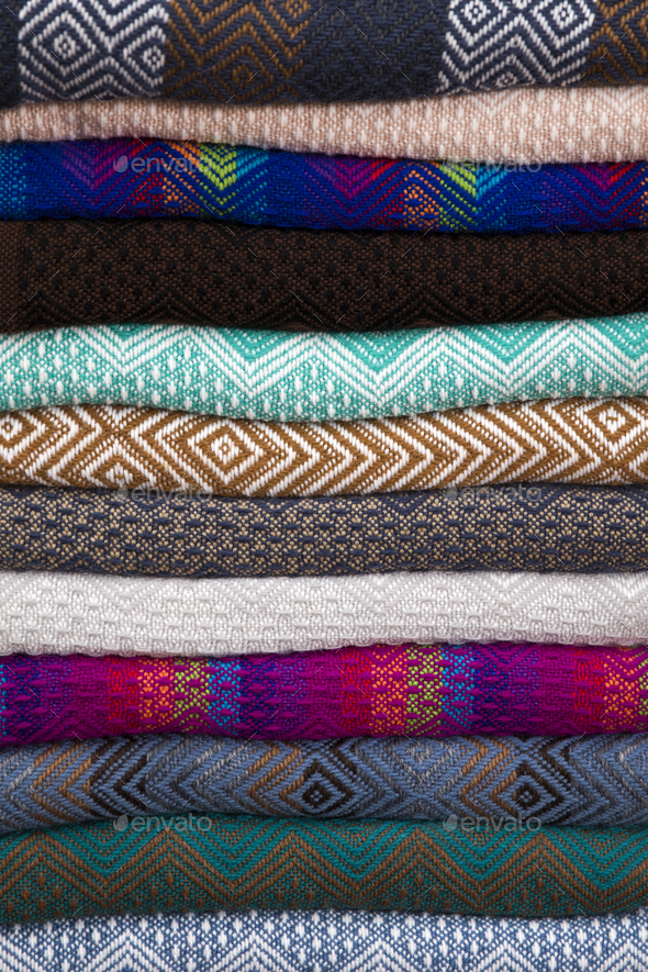 Colorful traditional peruvian fabrics on the market Stock Photo by ...