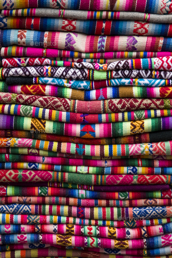 Colorful traditional peruvian fabrics on the market Stock Photo by ...