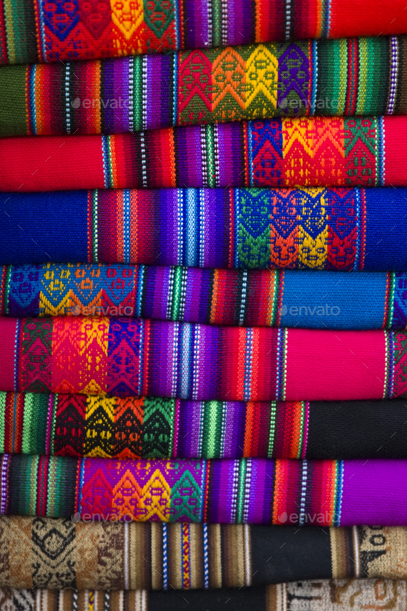 Colorful traditional peruvian fabrics on the market Stock Photo by ...