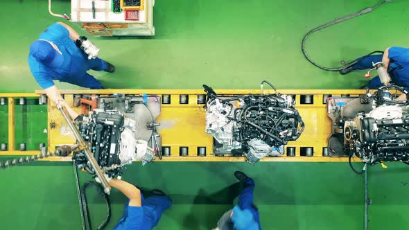 Car Factory Workers Assembling Car Engines, Stock Footage | VideoHive