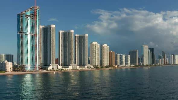 Skyscrapers Are Reflecting in Green Atlantic Ocean. Scenic Urban ...