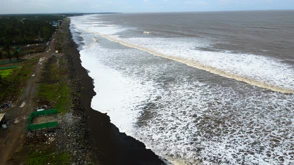 beach at vasi rajodi beach waves india mumbai maharashtra drone shot ...