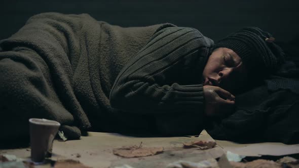 Homeless Person Suffering From Tuberculosis Lying on Floor and Coughing ...