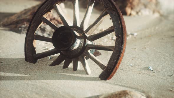 Large Wooden Wheel in the Sand, Motion Graphics | VideoHive