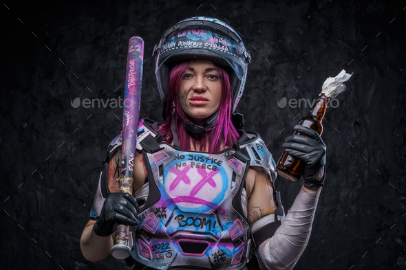 Brave woman protester with molotov cocktail against dark background ...
