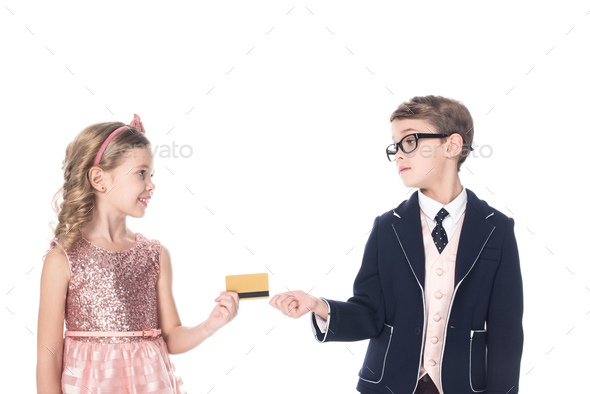 adorable fashionable children holding golden credit card isolated on ...