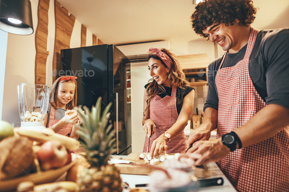 Teamwork In The Kitchen Stock Photo by micens | PhotoDune