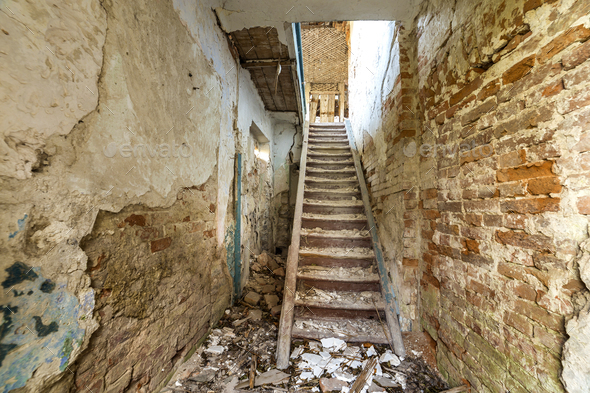 Large spacious forsaken empty basement passageway Stock Photo by bilanol