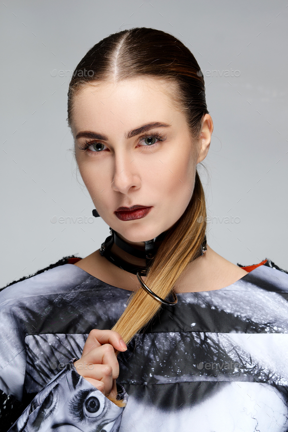 Closeup portrait of fashion model with perfect skin, dark matt lipstick ...